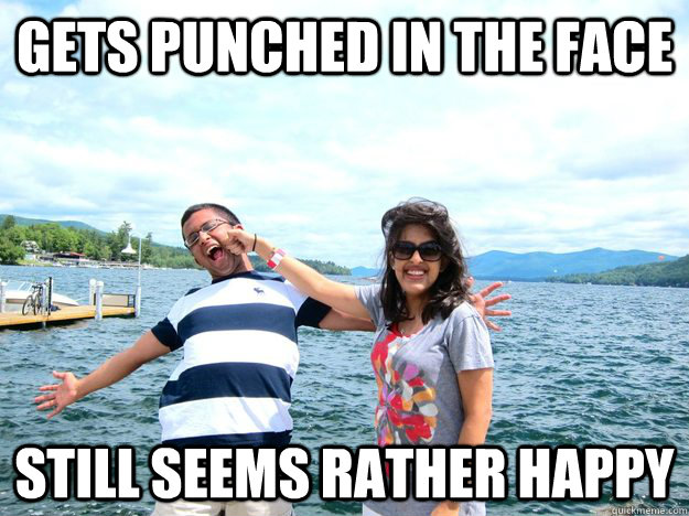 gets punched in the face still seems rather happy - Oblivious to Pain Ali - quickmeme