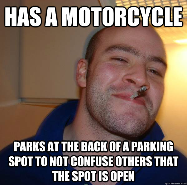 Has a motorcycle parks at the back of a parking spot to not confuse others that the spot is open ...